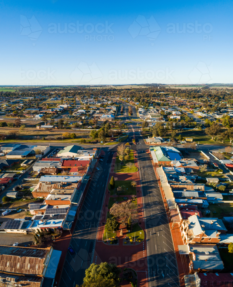 Image of Main street and railway line crossing in rural country town of ...