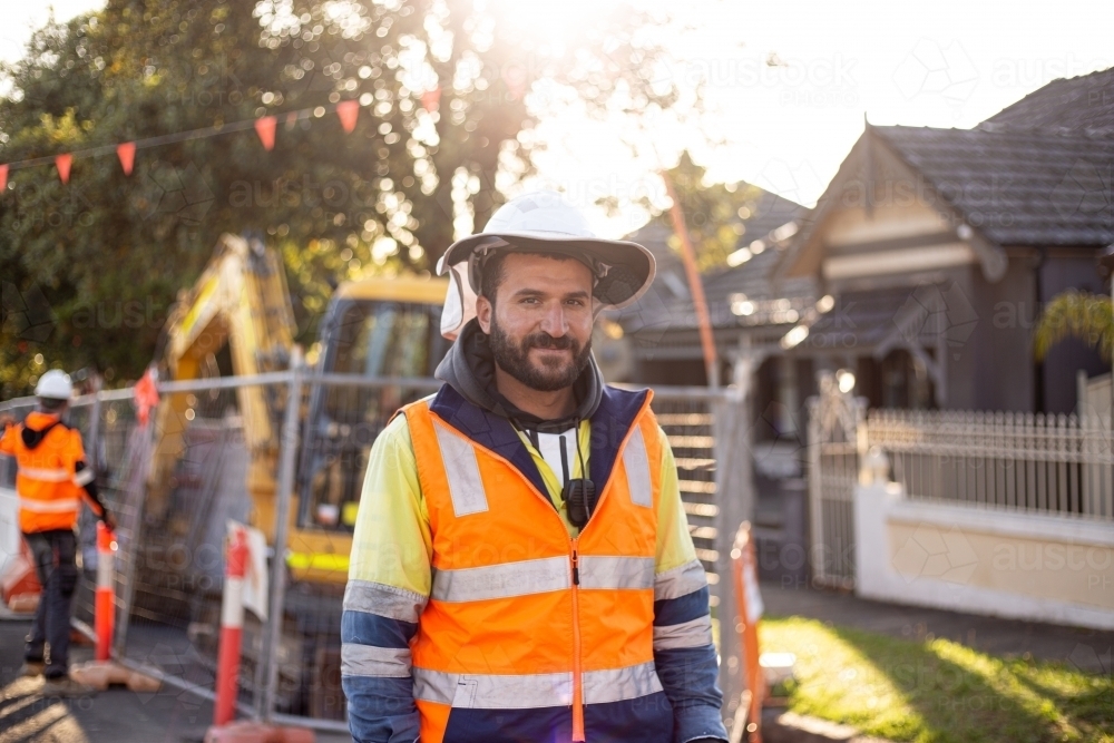 Image of man road worker with beard wearing white hard hat with high ...