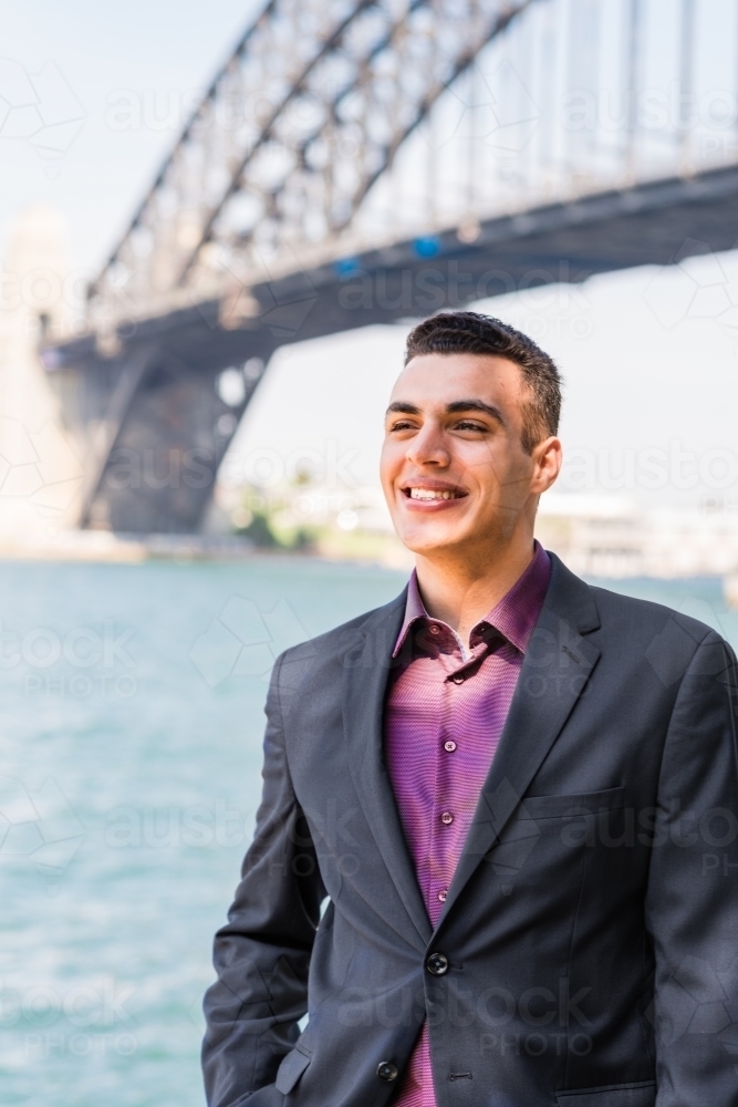 Image of man standing under The Bridge - Austockphoto