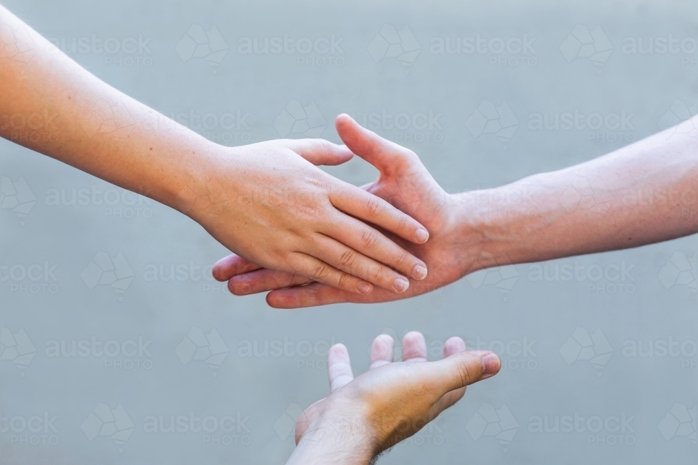 Image of mediation concept - hands shaking in agreement with mediator ...