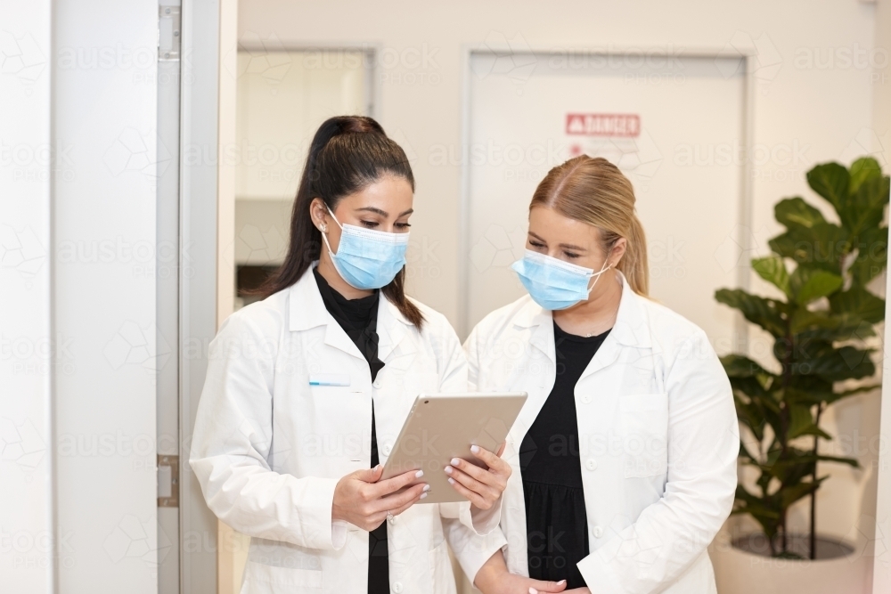 Image of Medical practitioners working together at their practice ...