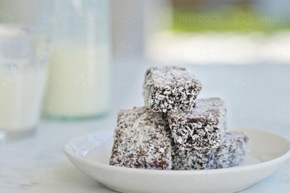 Image of Mini lamingtons on a plate - Austockphoto