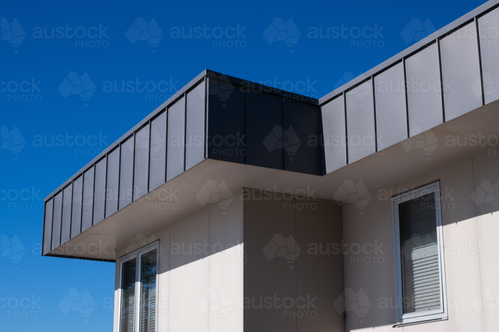 Image of modern home with a flat, square roof - Austockphoto