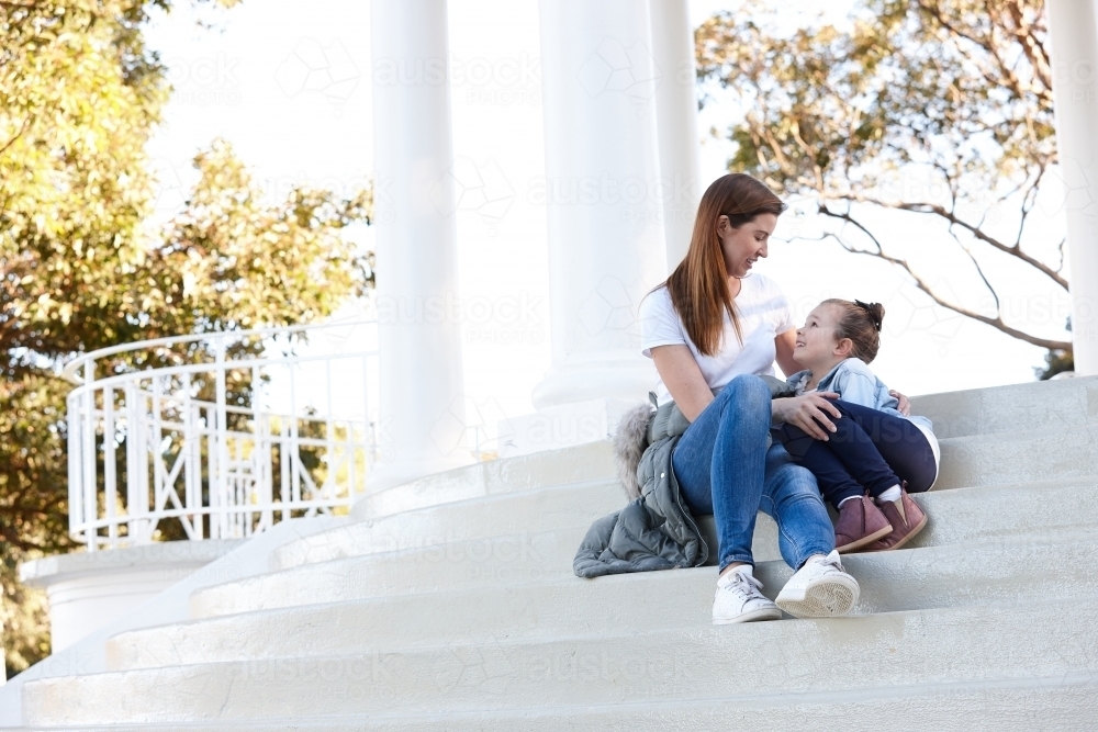 Image of Mother and daughter sharing time together outdoors - Austockphoto