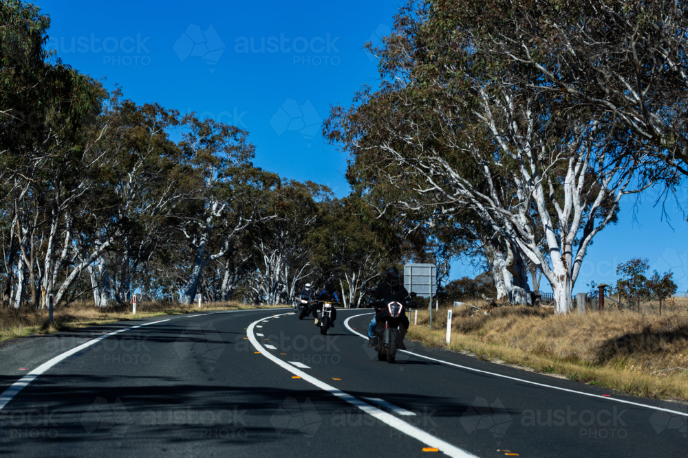 Image of motorbikes riding together along New England Highway road in ...