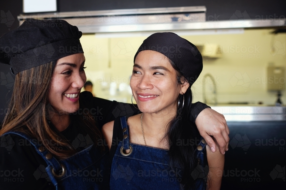Image of Multicultural Asian small business owners/ waitress in Thai ...