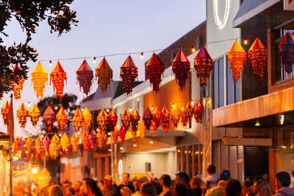 Image of Multicultural celebration event with lanterns hanging above ...