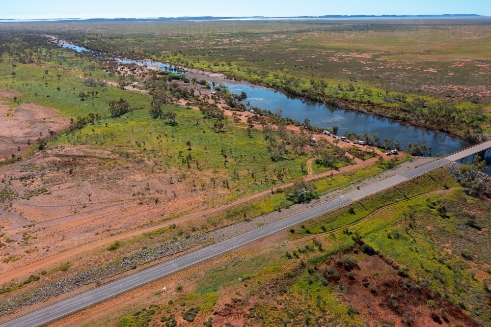 Image of national route one crossing river in the Pilbara - Austockphoto
