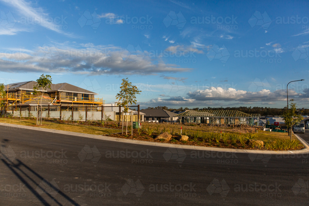 Image of new housing estate and roads near Brisbane under a blue sky ...
