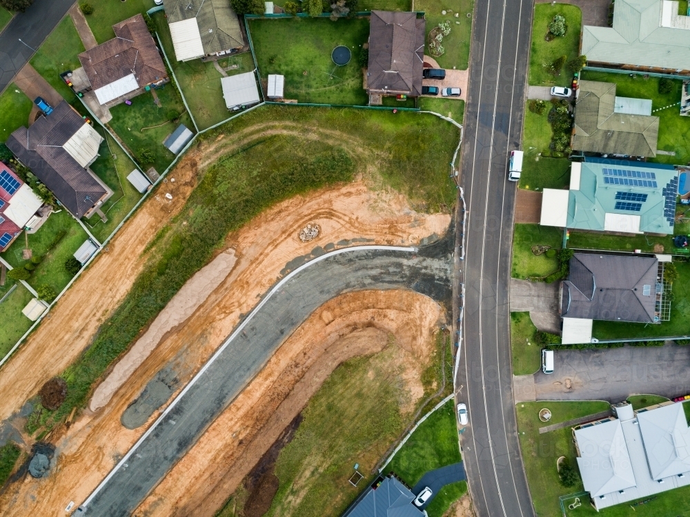 Image of New road and housing area under development - Austockphoto