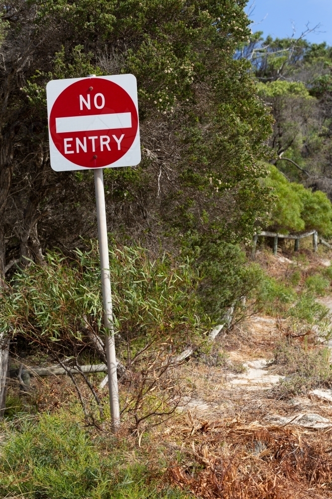 Image of No Entry sign on isolated road - Austockphoto