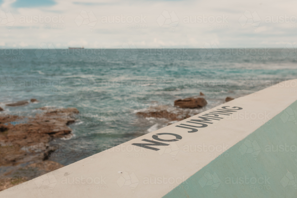 Image of 'No Jumping' sign on the concrete spectator seating at ...