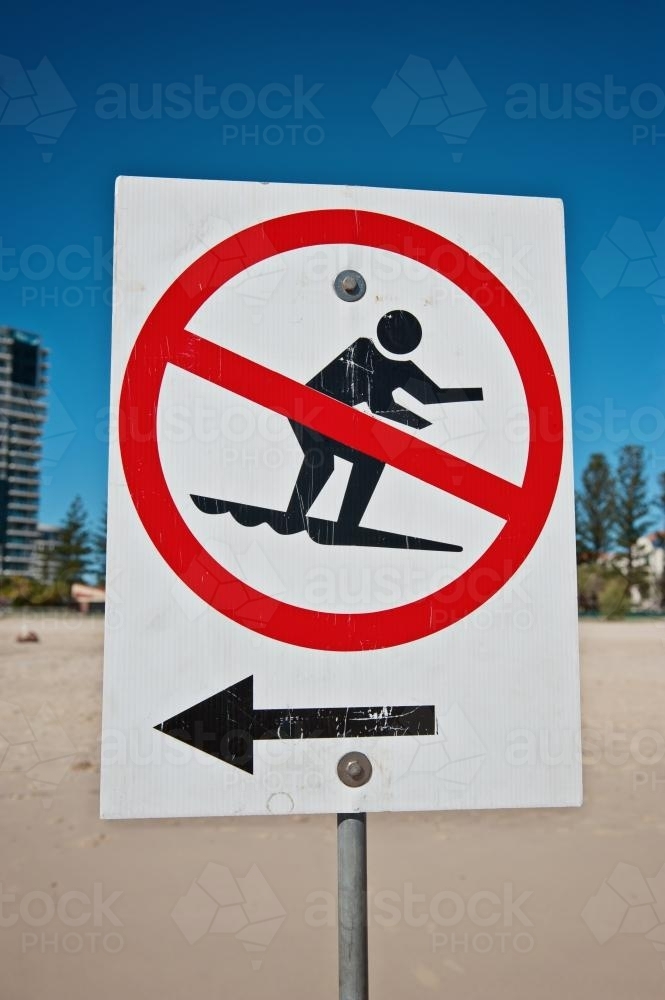 Image of No surfing sign at the beach - Austockphoto
