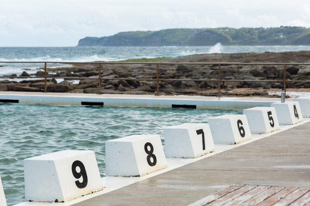 Image of Numbered lane marker at ocean pool - Austockphoto