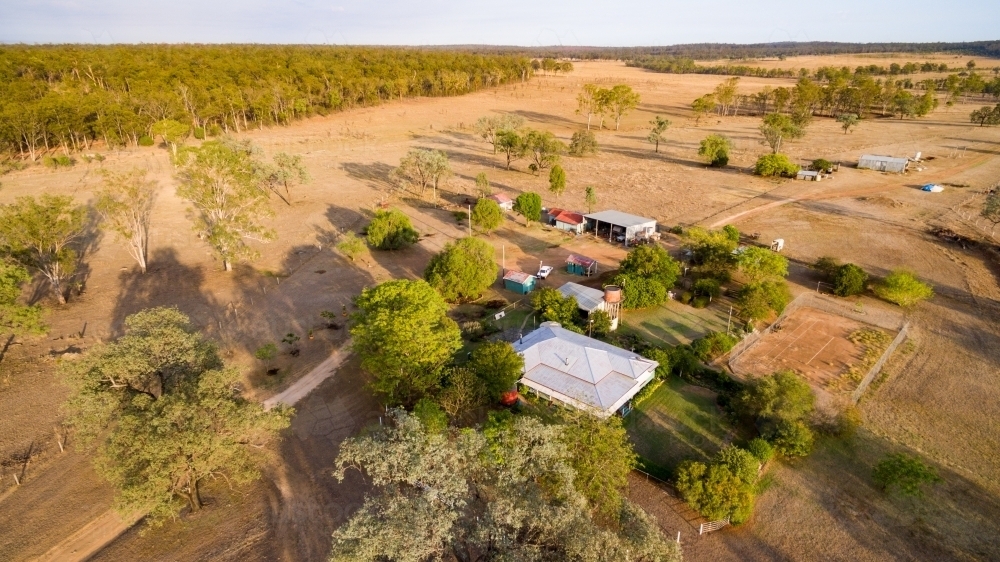 Image of Oblique aerial view of a rural homestead near day's end ...