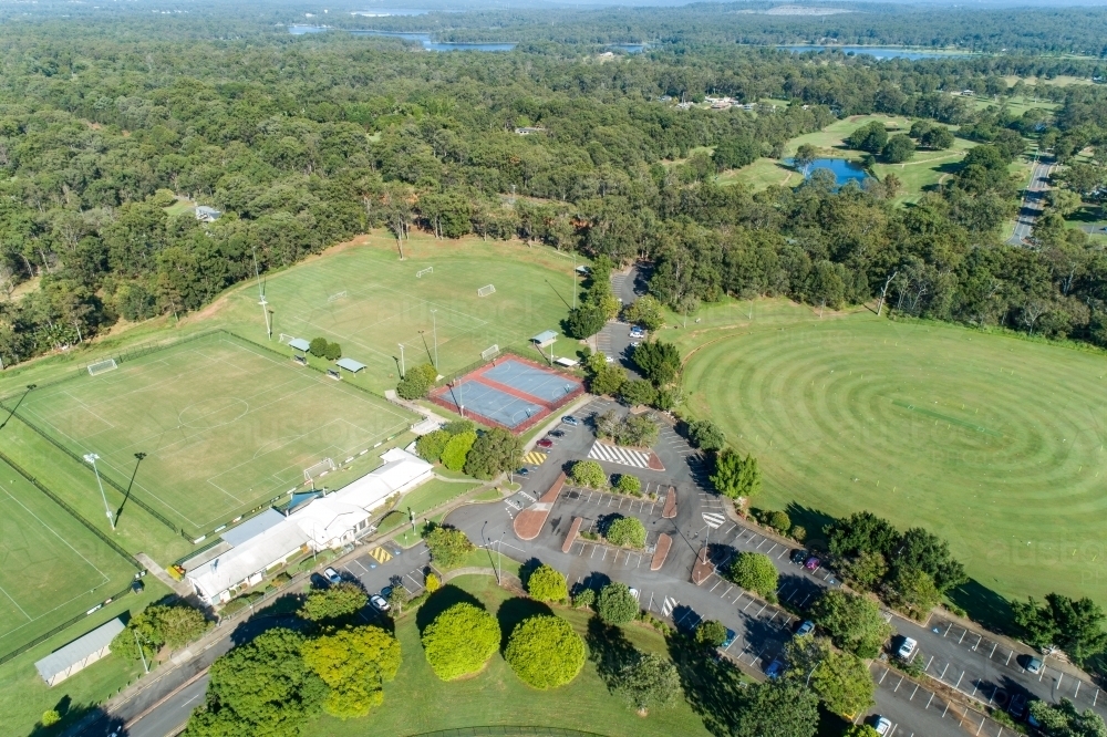 Image of Oblique aerial view of grassy soccer football fields. plus ...