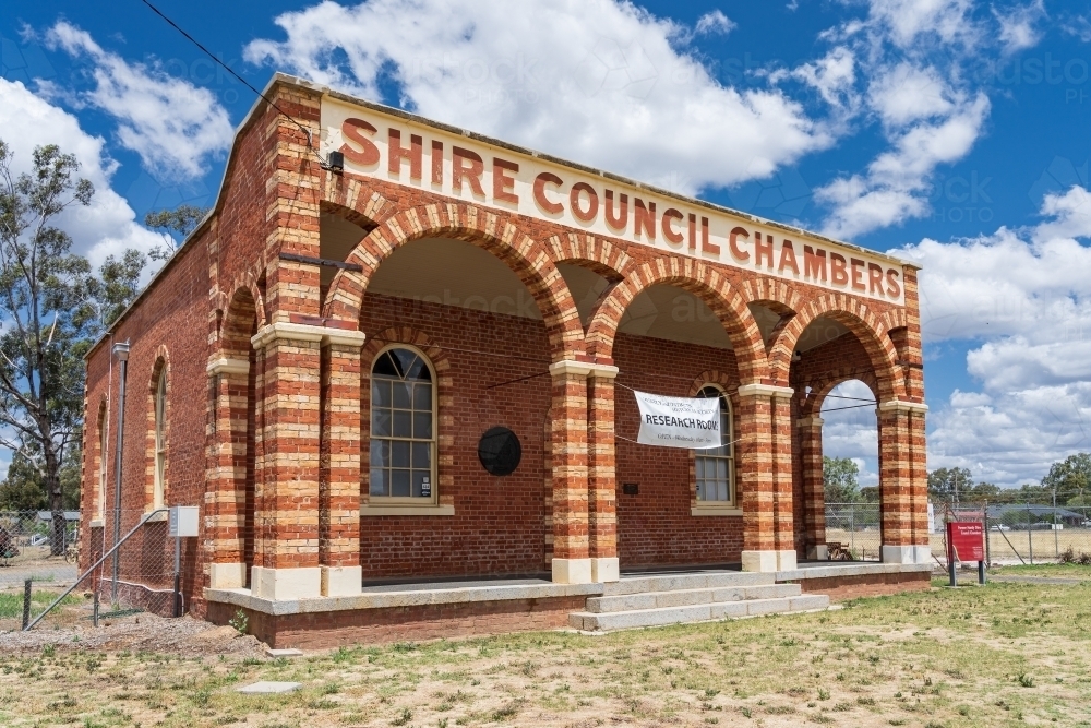 Image of Oblique view of an historic council chambers building with ...