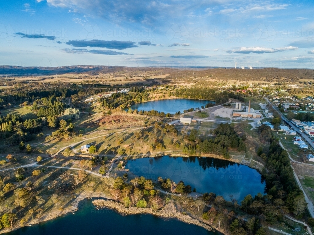 Image of old quarry now a lake beside cement works in Portland seen ...