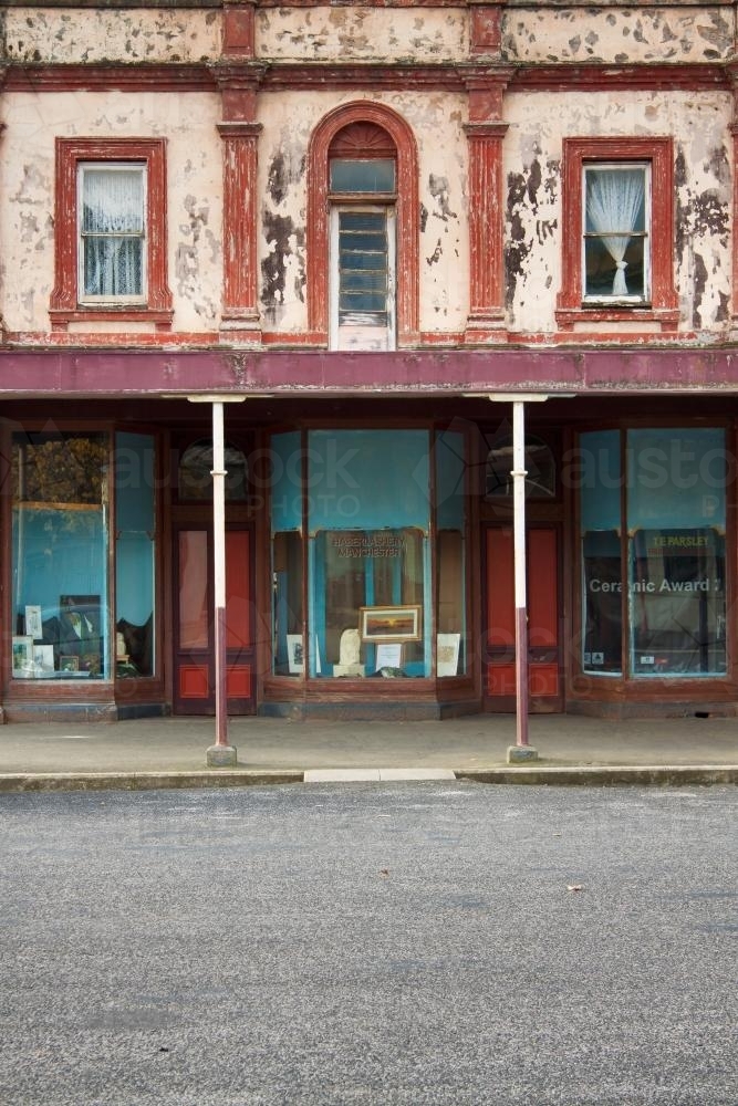 Image of Old shop fronts in a deserted street - Austockphoto
