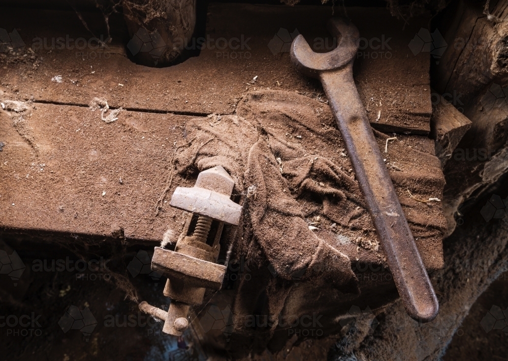 Image of Old tools on a dusty bench looking from above - Austockphoto