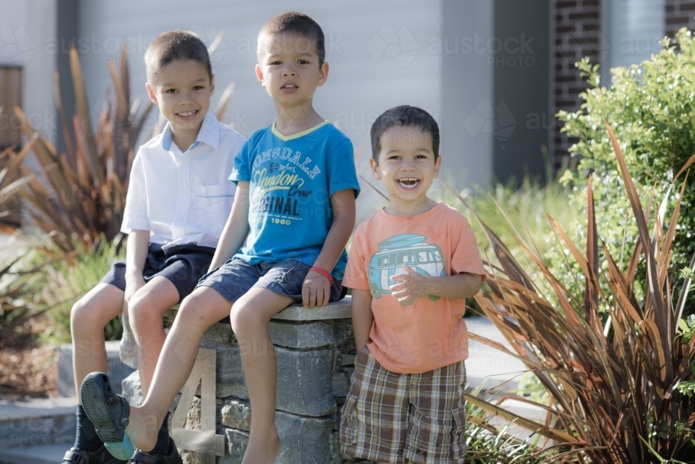 Image of Older brother says goodbye to his siblings on his first day ...