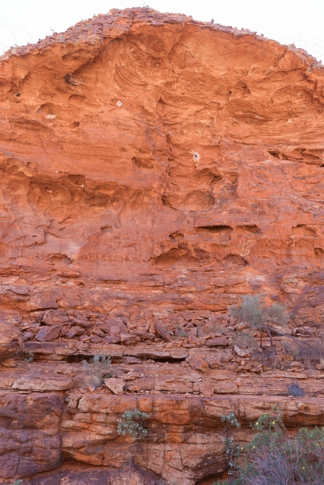 Image of Orange rock cliff face - Austockphoto