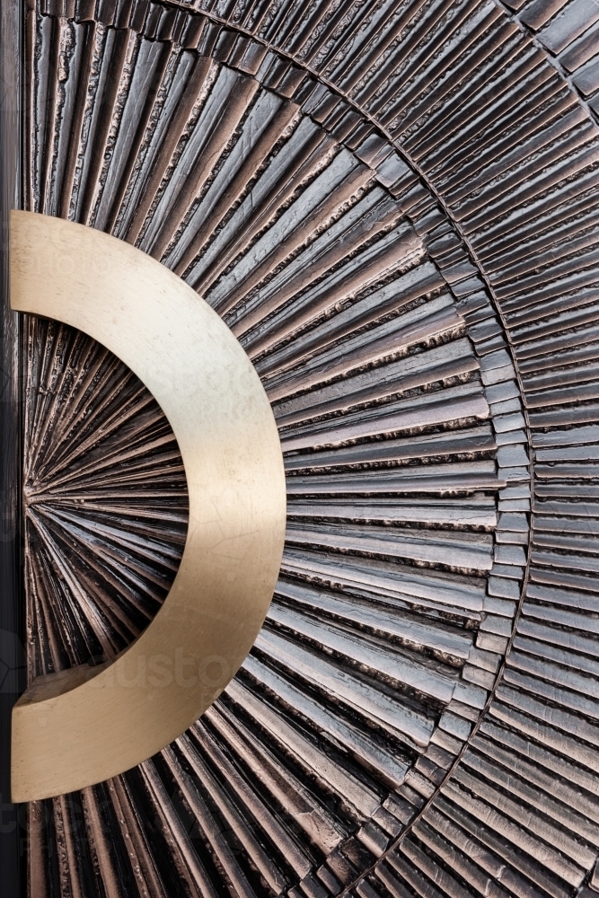 Image of ornate metal door with circle pattern - Austockphoto