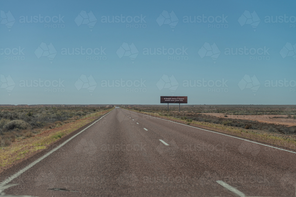 Image of Outback Stuart Highway warning sign - Austockphoto