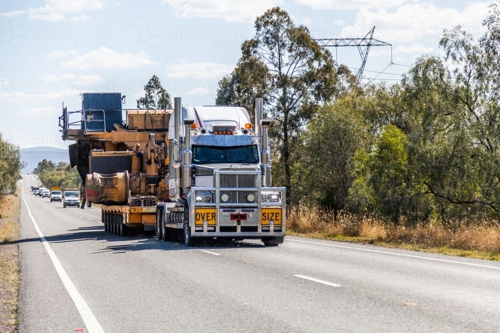 Image of Over size load on truck transporting mining equipment ...