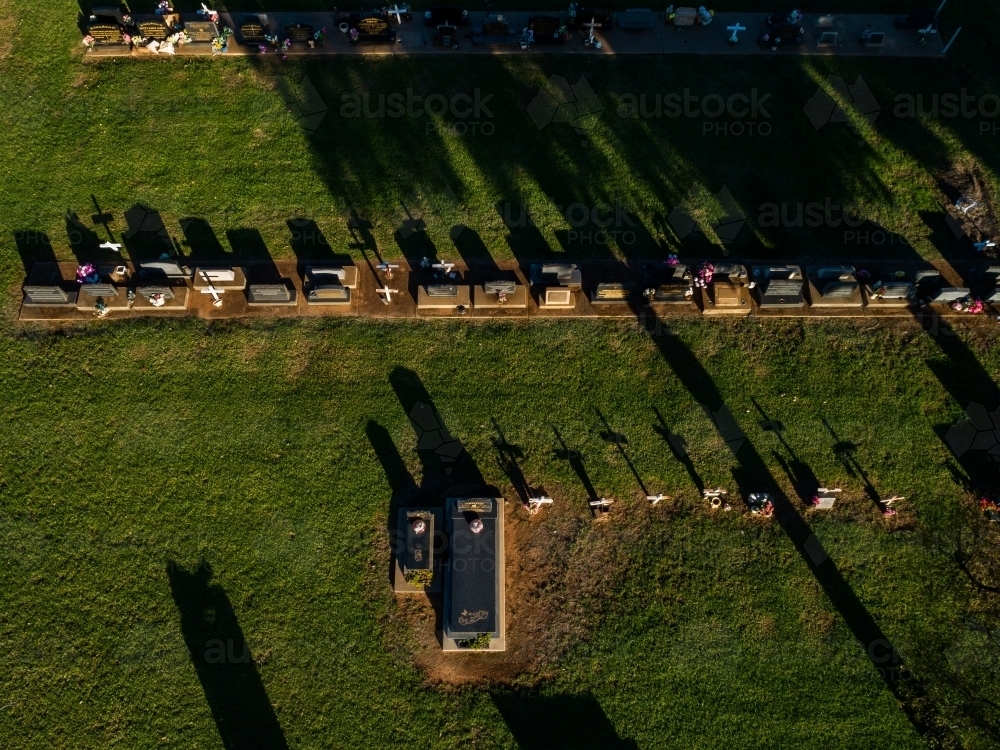 Image of Overhead aerial view of cross shadows on grass at country ...
