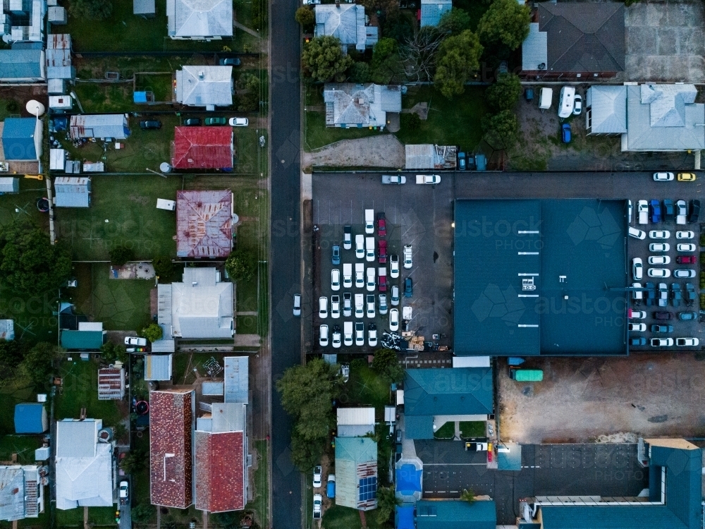 Image of Overhead aerial view of full car lot with parked vehicles ...