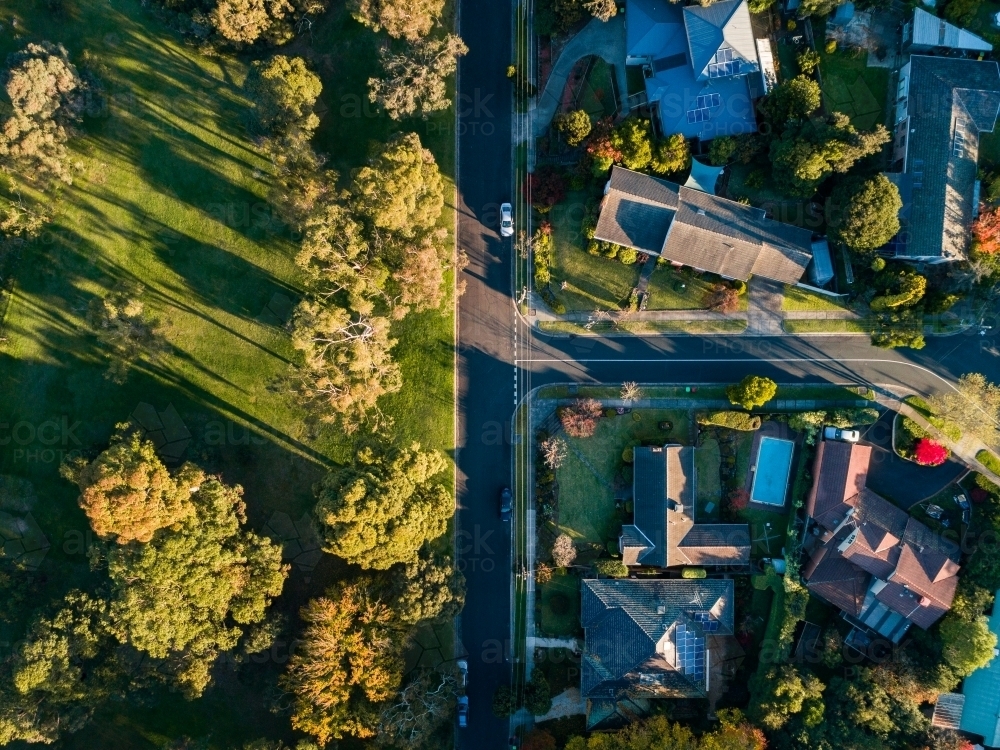 Image of Overhead aerial view of t intersection in city suburb with ...