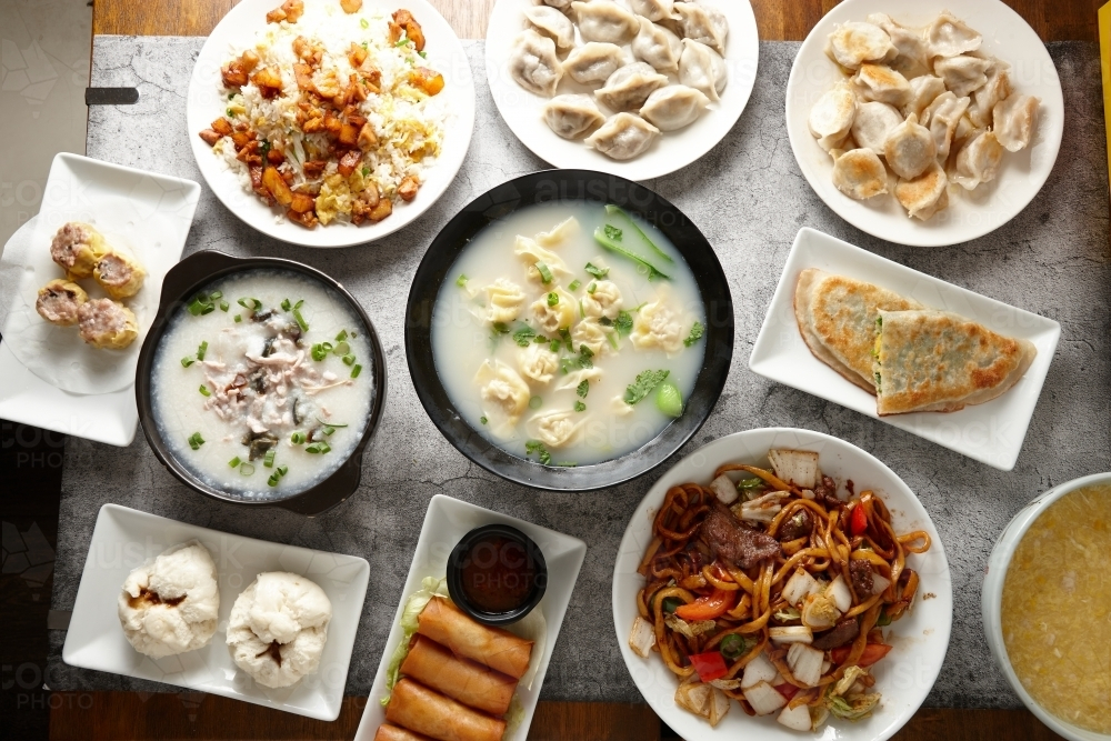 Image of Overhead shot of different food dishes on a flat surface ...