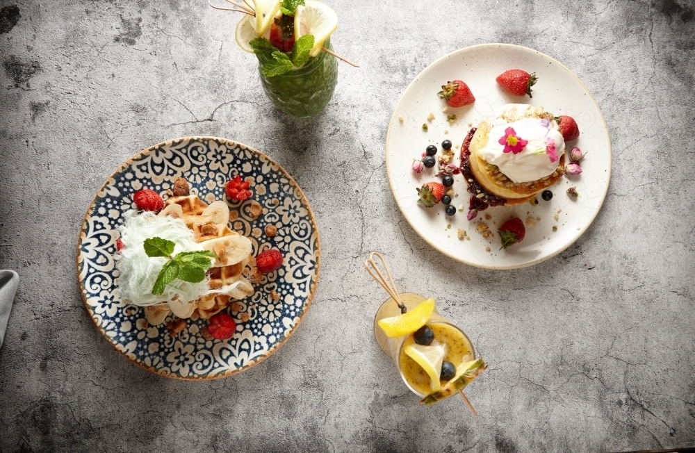 Image of Overhead shot of two pancake, ice cream and fairy floss ...