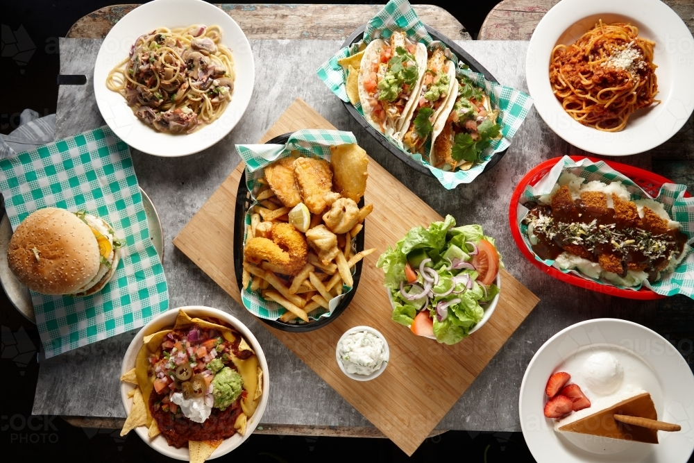 Image of Overhead shots of different food dishes on a flat surface ...