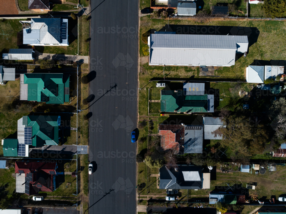 Image of Overhead top down view of rooftops in country town on winter ...