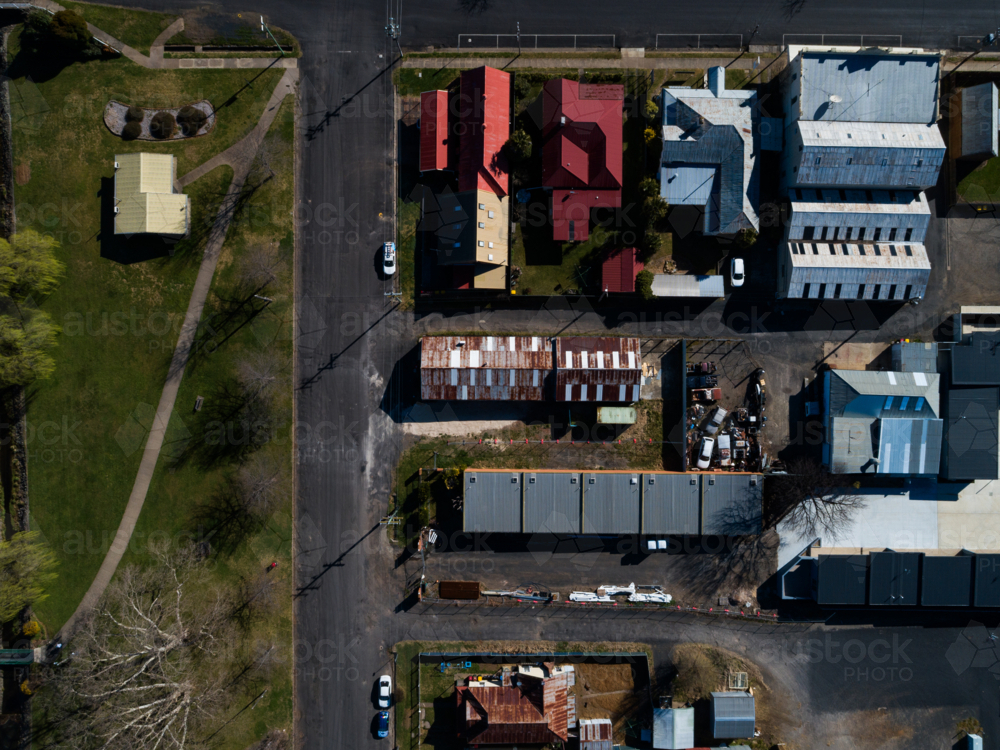 Image of Overhead top down view of rooftops in country town on winter ...