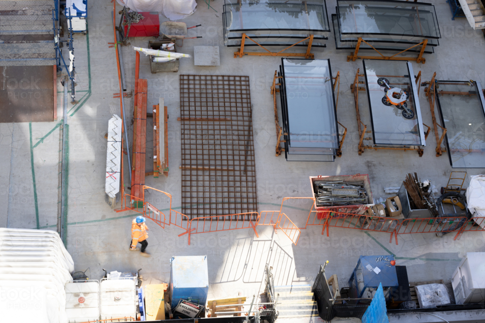 Image of Overhead view of a construction site with construction worker ...