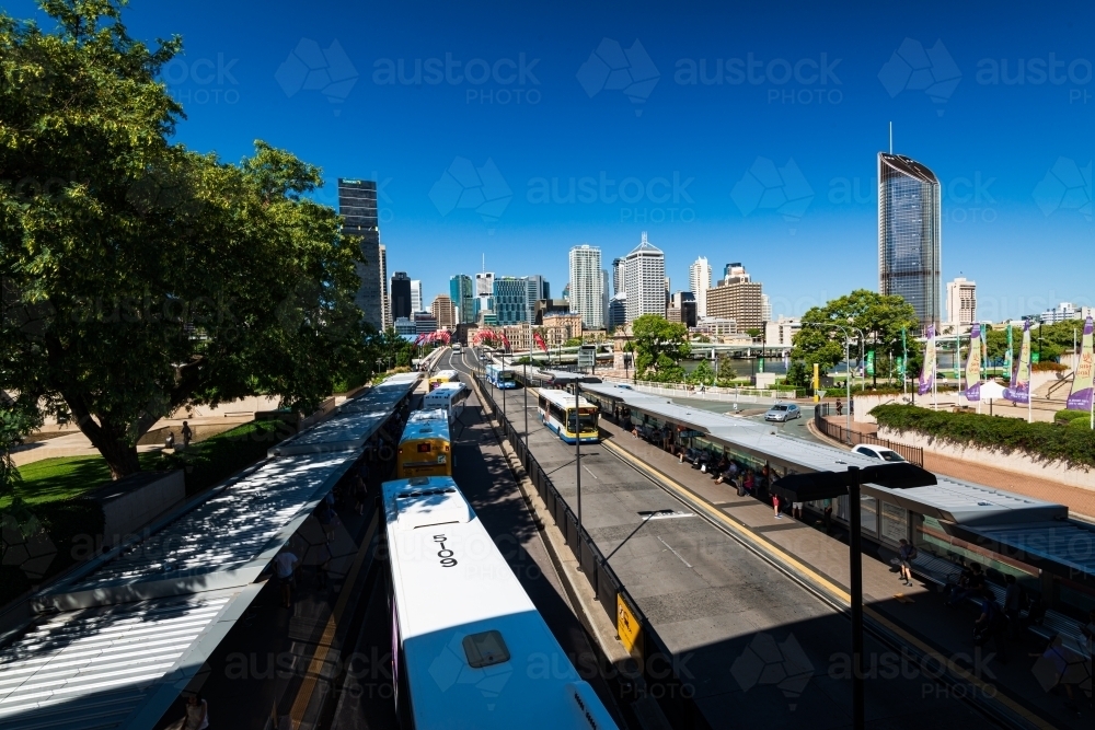 Image of Overhead view of buses at bus station leading to bridge and ...