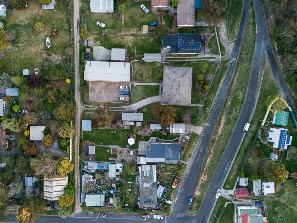 Image of Overhead view of houses and properties one yard is full of ...