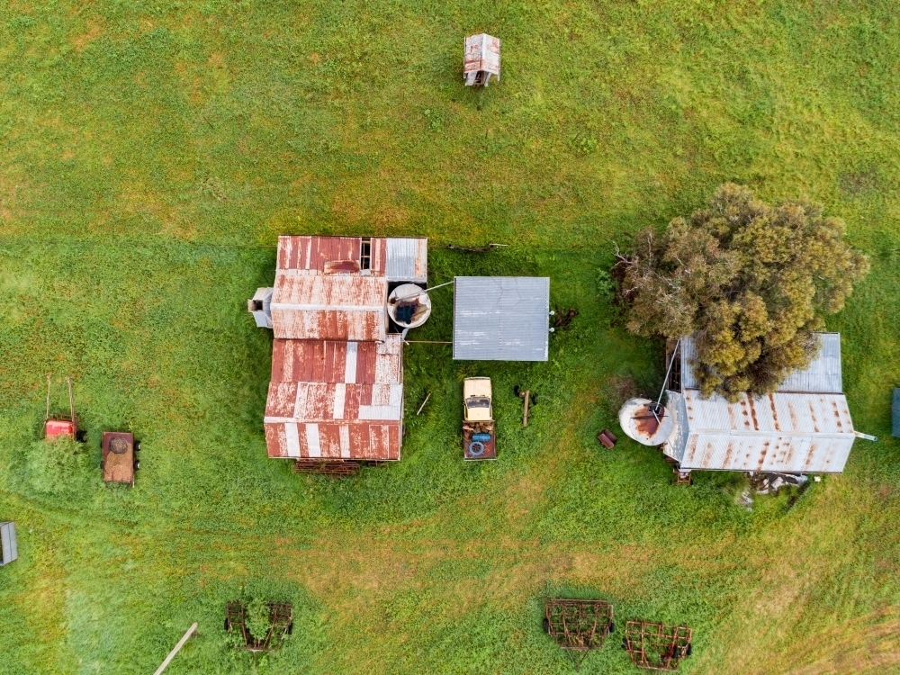 Image of Overhead view of old buildings on farm - Austockphoto