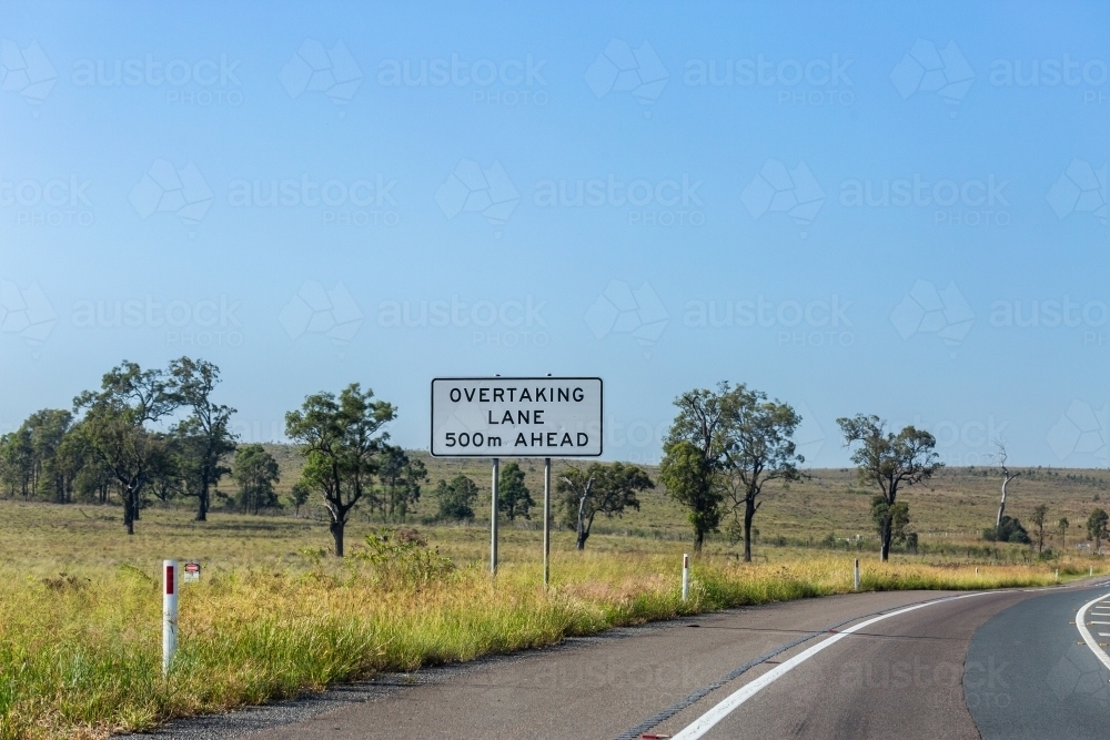 Image of Overtaking lane 500m ahead sign beside road in rural Australia ...
