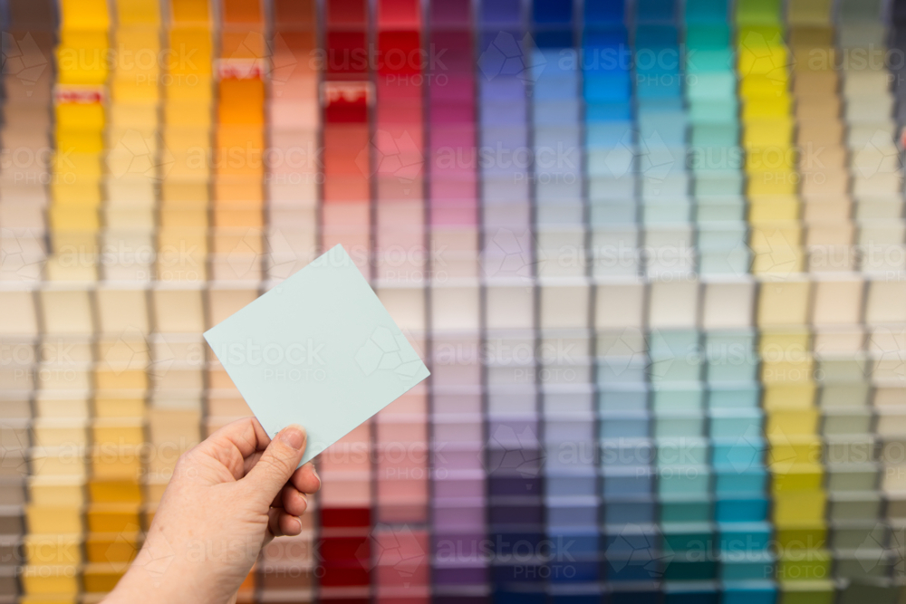 Image of paint sample colours at a hardware store - Austockphoto