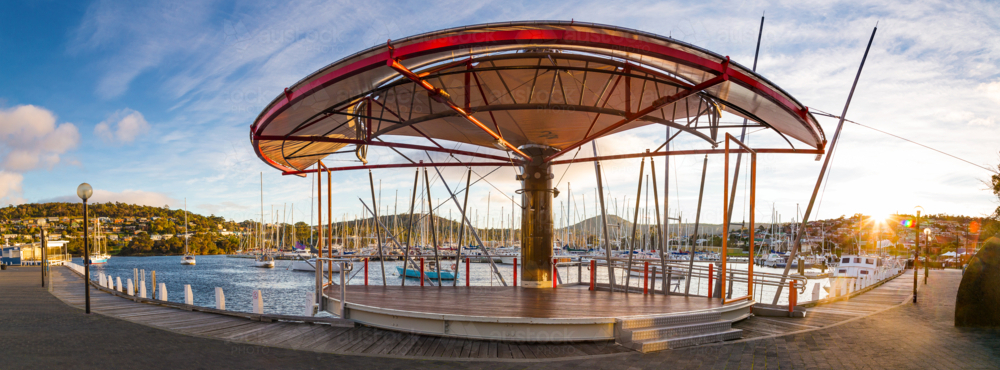 Image of Panorama view of sunrise looking through a circular awning ...