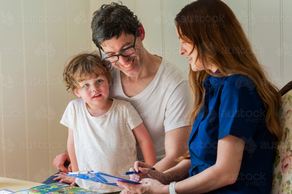 Image of Parent with child talking with speech pathologist clinician ...