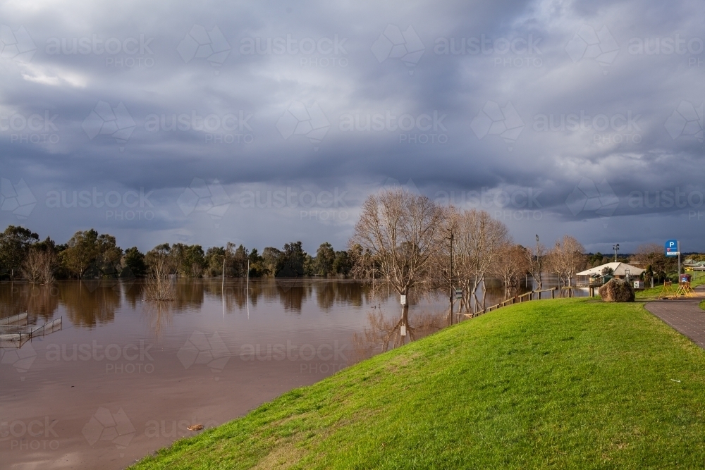 Image of Park sports playing fields covered with floodwater seen from ...