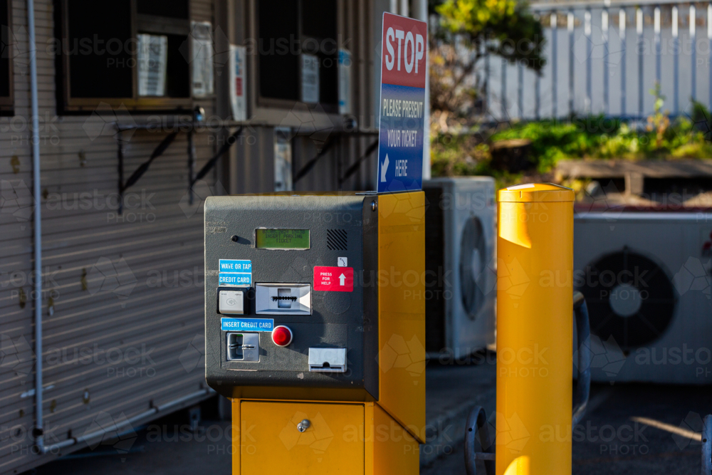 Image of parking ticket machine at paid carpark exit - Austockphoto