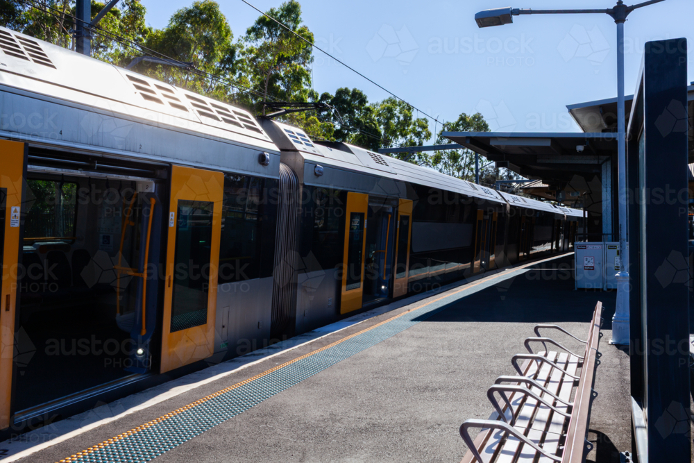 Image of Passenger train passing platform of Narwee station in Sydney ...