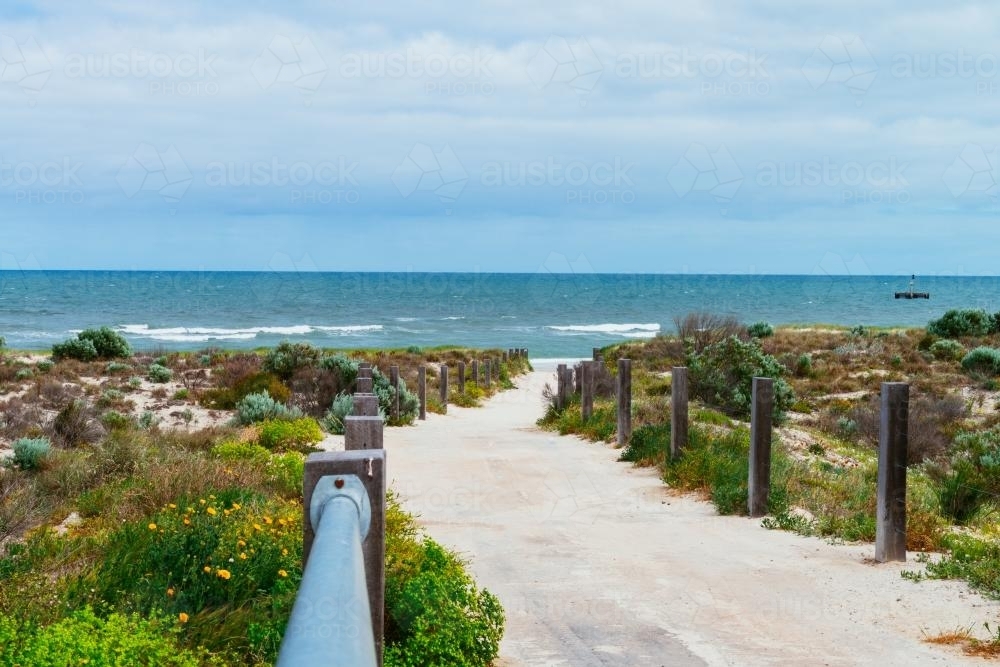 Image of pathway to a beach - Austockphoto