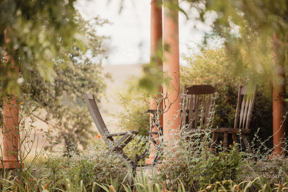 Image of Peaceful outdoor seating area under front verandah of country ...